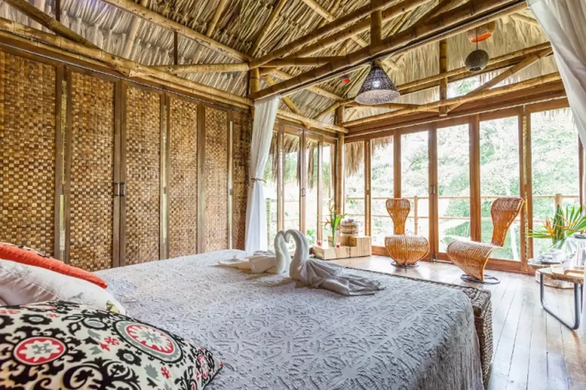 Cozy bedroom in a hut on a farm in the tropical forest of the Andean Mountains (Columbia).