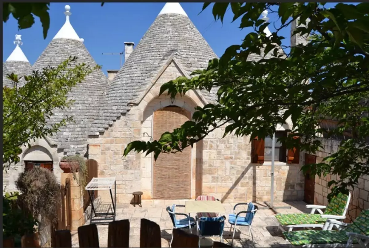 Cozy hoflike fan in gasthûs (Trullo Eder, Italië).