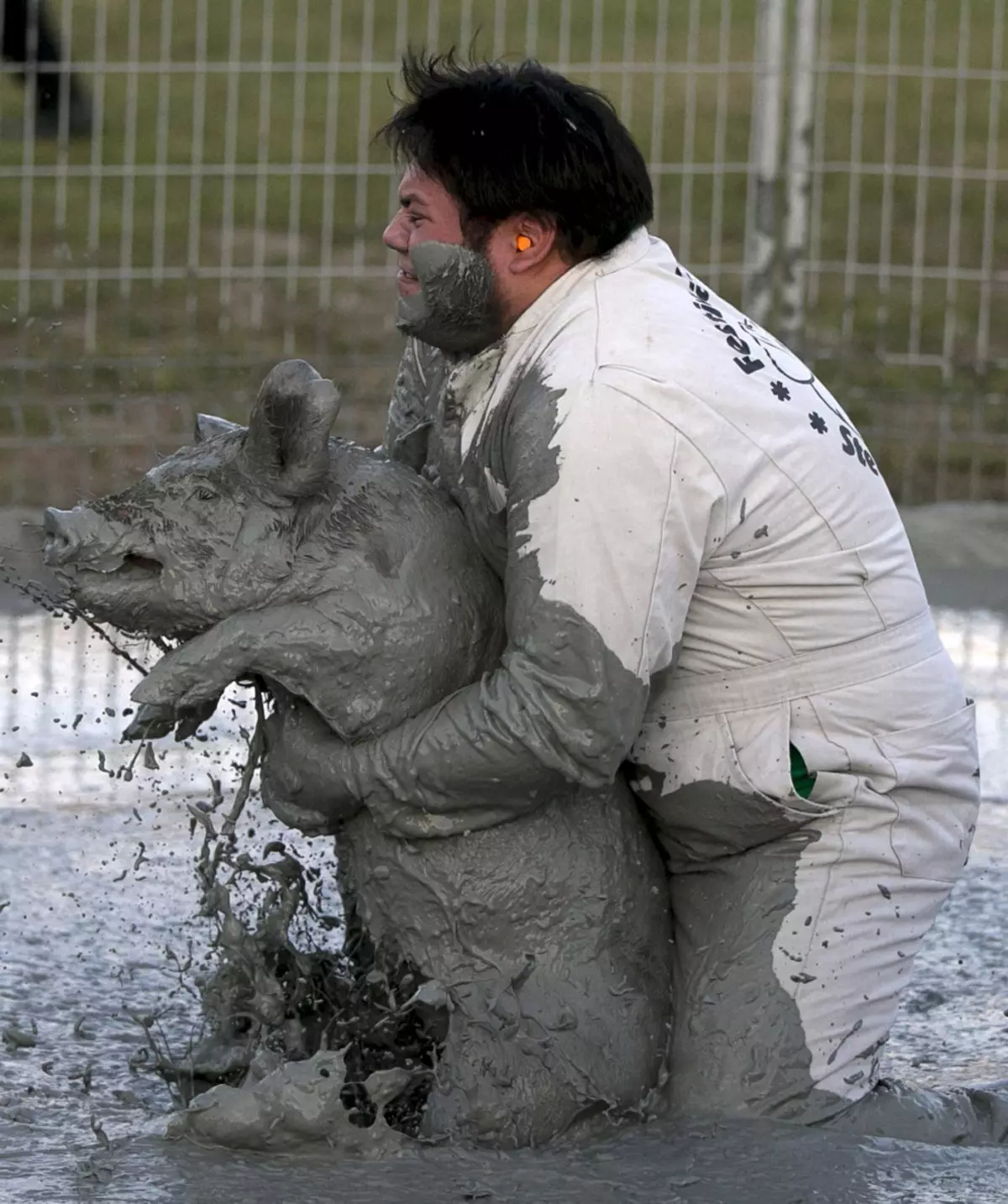 Paano ang Pig Festival sa Quebec, Canada. Photographer Christinne Muschi. 3442_13