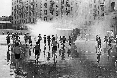 Children play in the splashes of fire hydrant, 1950. 28. That's the way it was, childhood passed